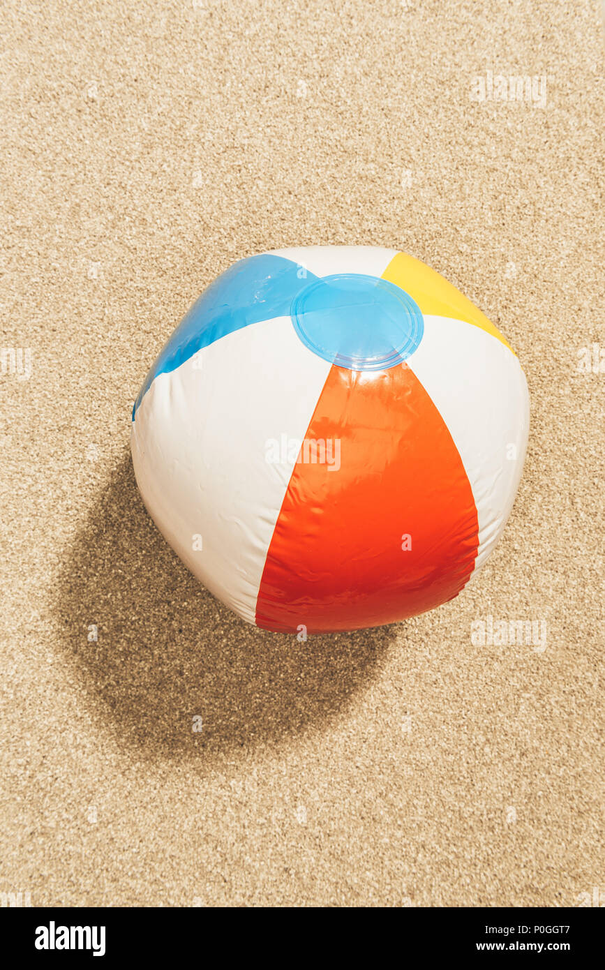 top view of colorful beach ball on sand Stock Photo - Alamy