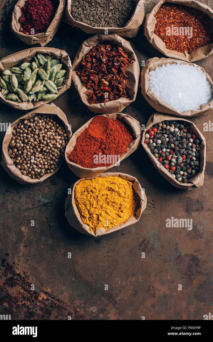 top view of indian spices in paper bags on table Stock Photo - Alamy