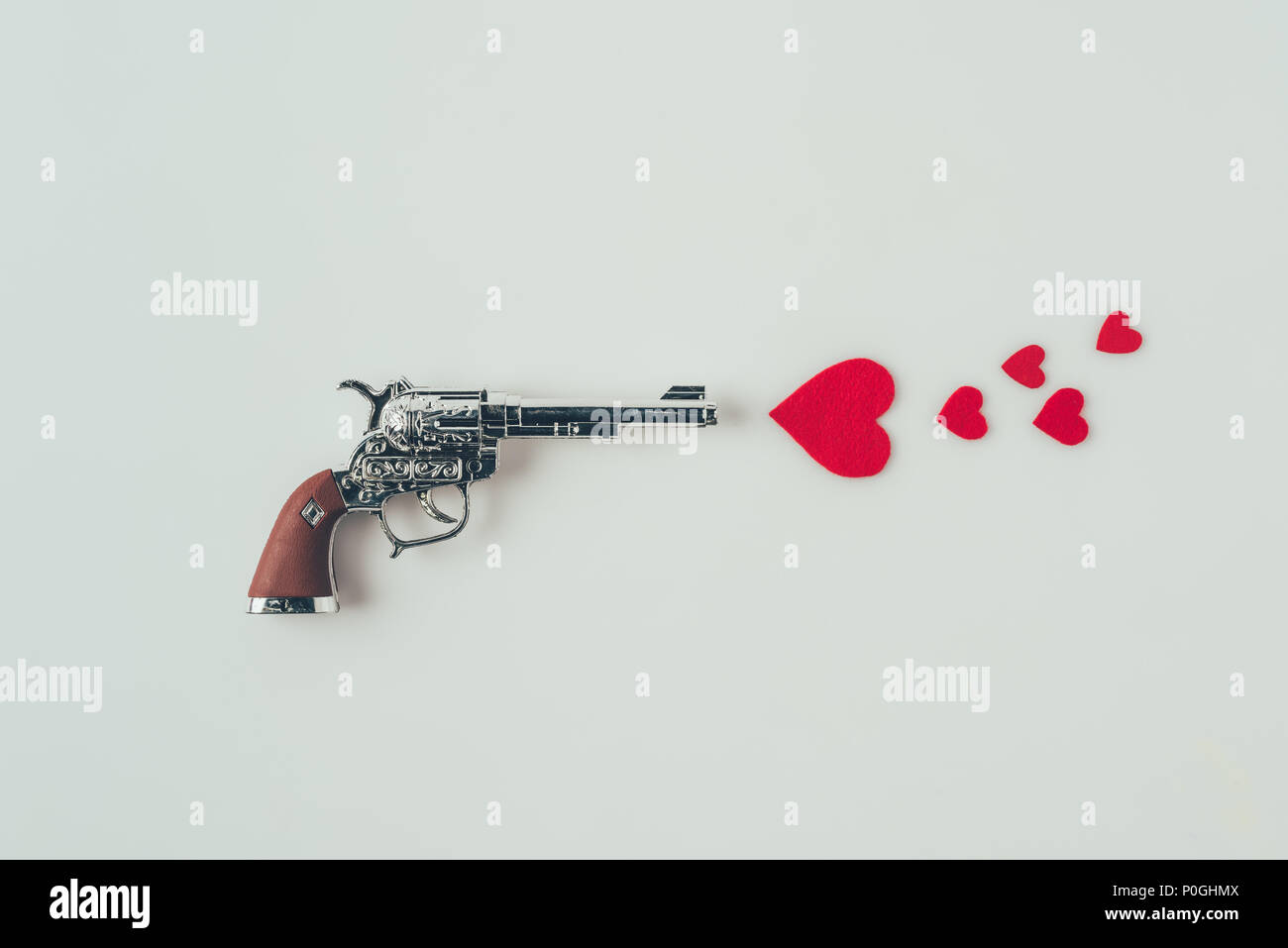 Gun Shooting Hearts