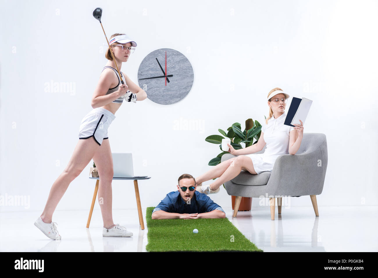 People playing golf hi-res stock photography and images - Alamy