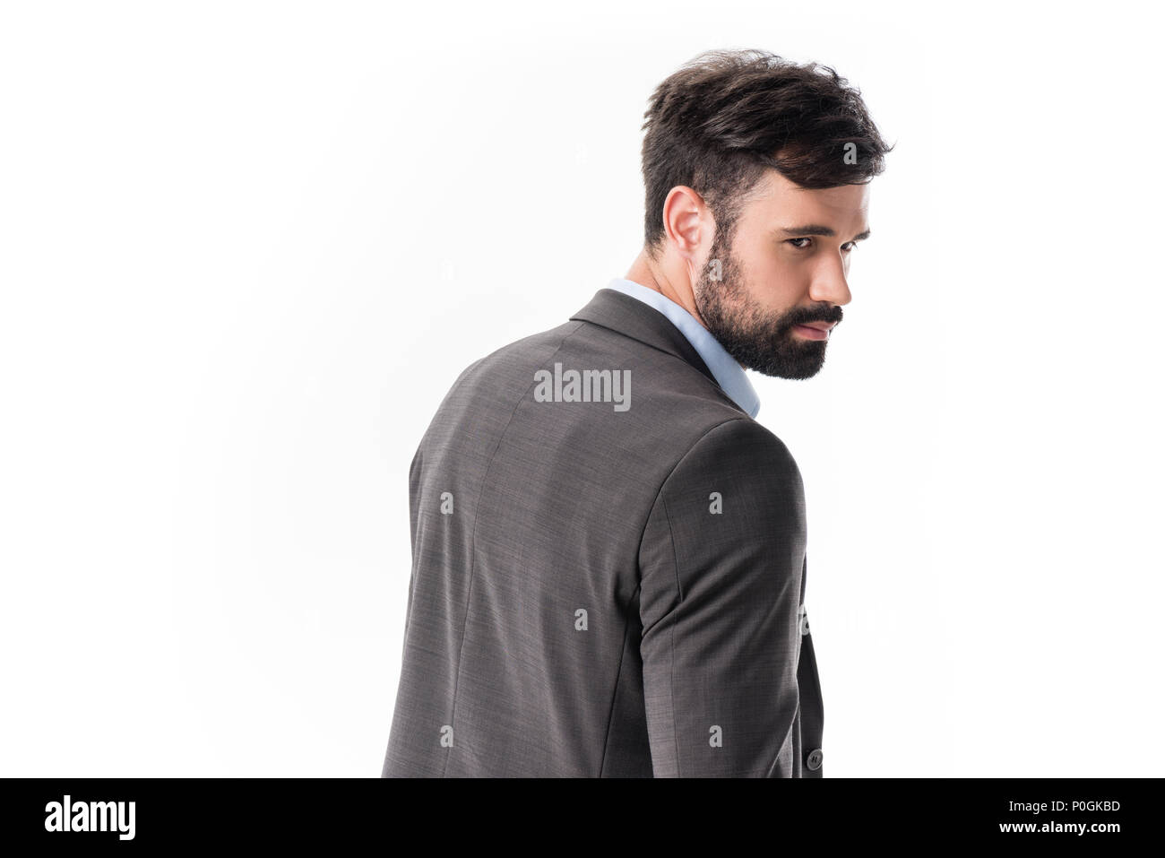 back view of young businessman in formal wear isolated on white Stock ...