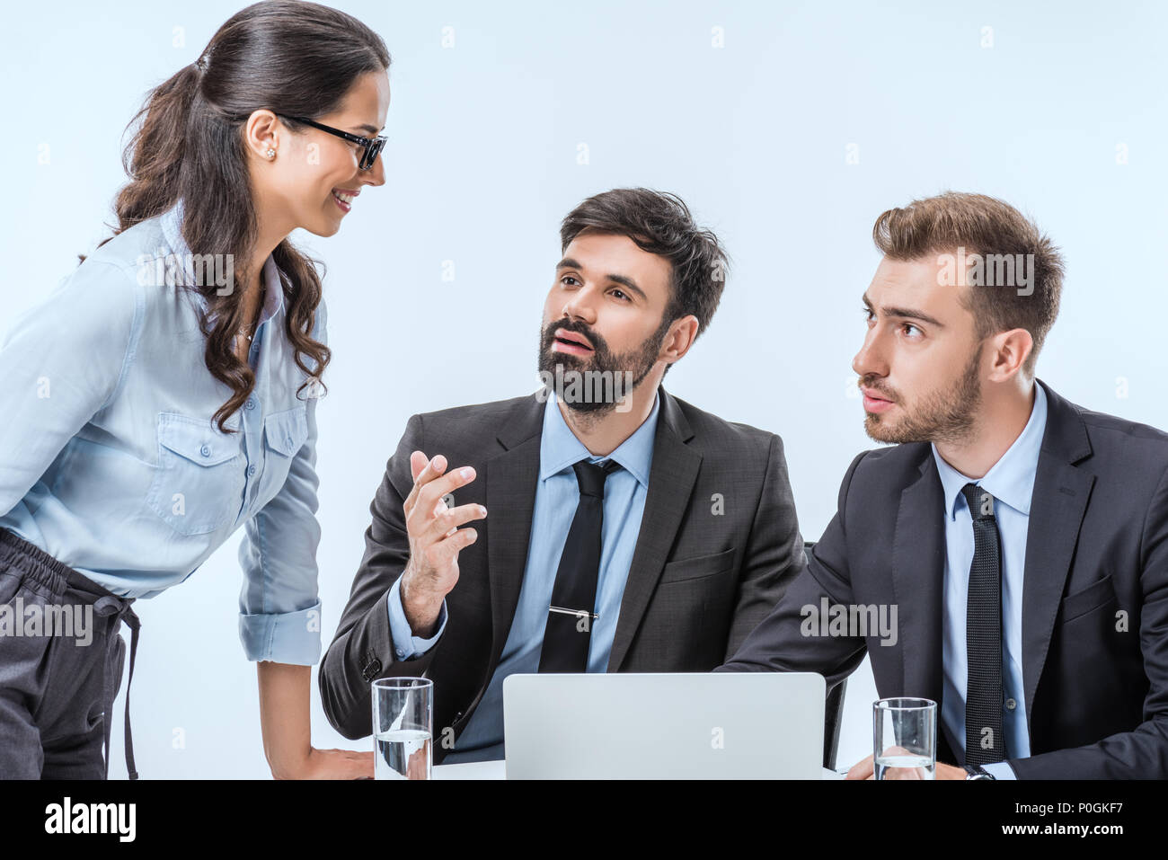 young business people having discussion while working together Stock ...