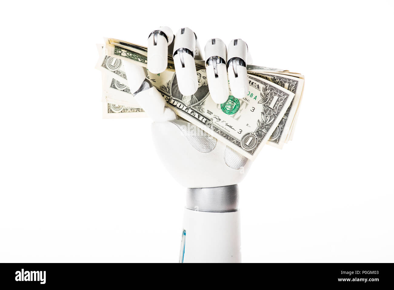 close-up view of robotic arm holding dollar banknotes isolated on white ...
