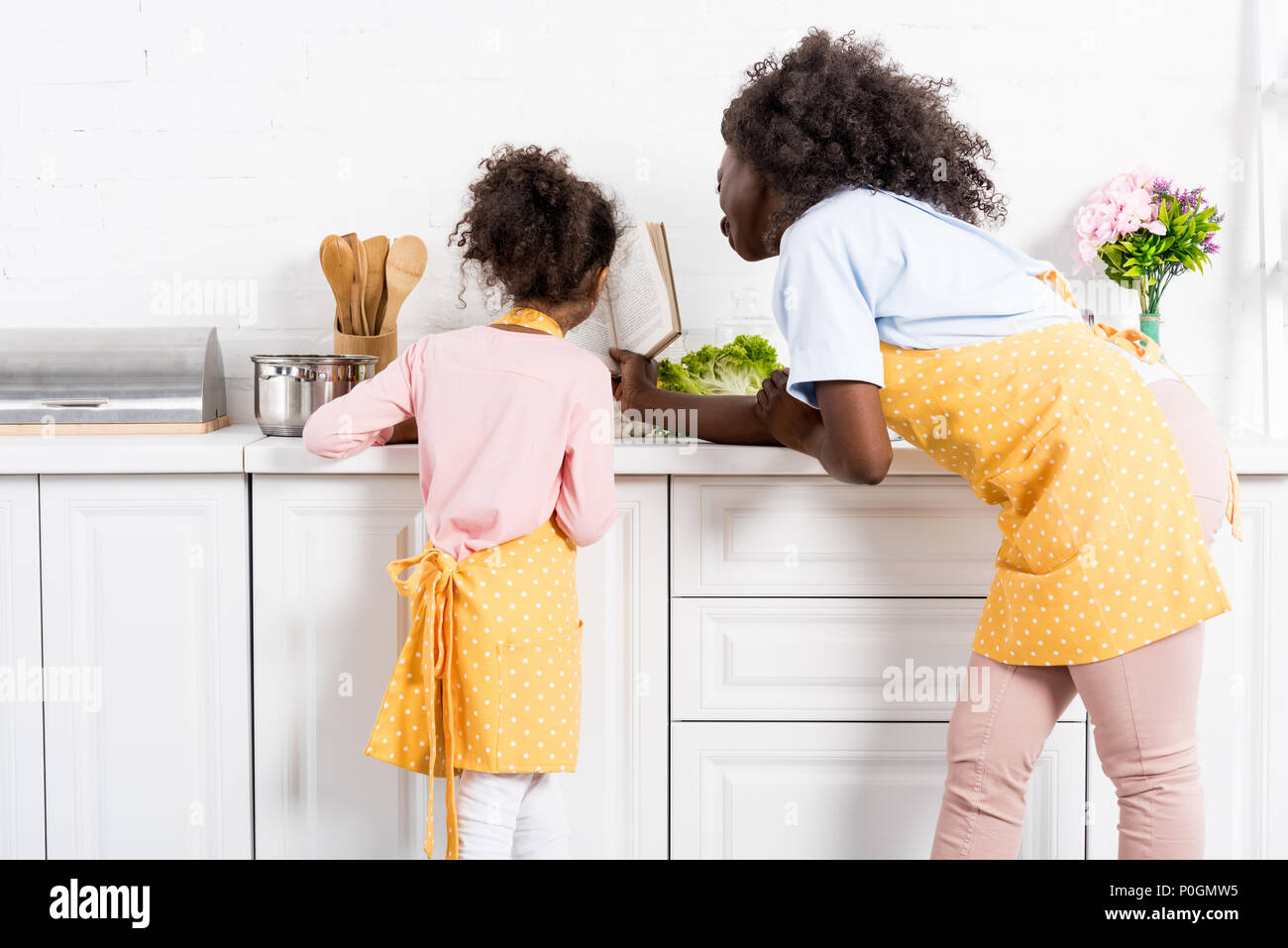 African child reading back view hi-res stock photography and images - Alamy
