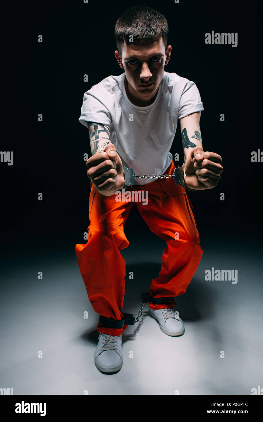 Man in orange uniform hi-res stock photography and images - Alamy