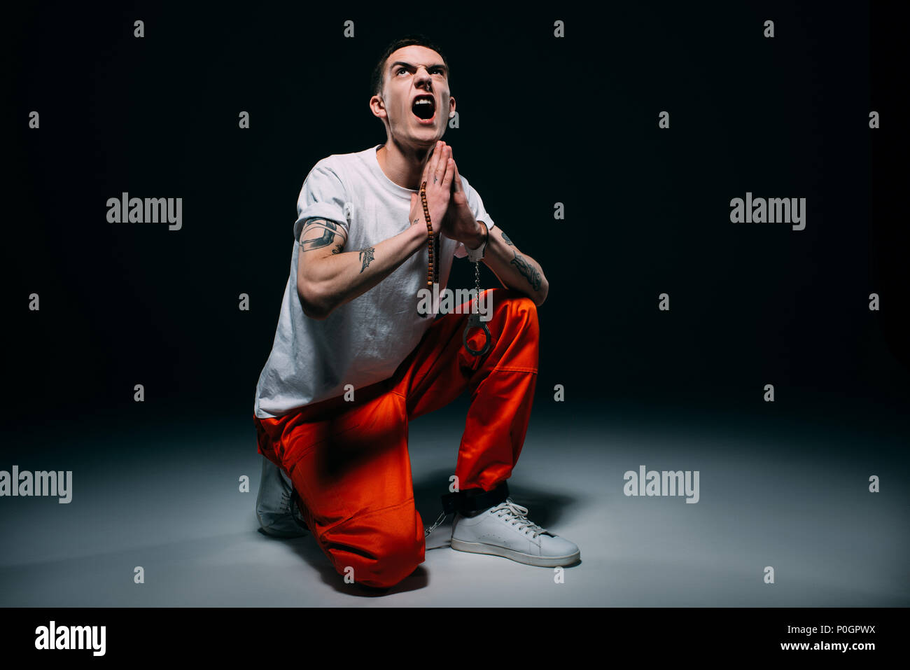 In prison uniform hi-res stock photography and images - Alamy