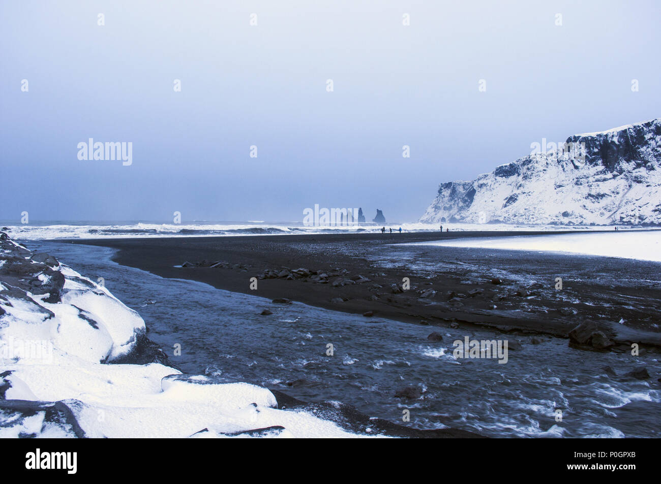 A breathtaking view of the famous black sand beach of the Icelandic ...