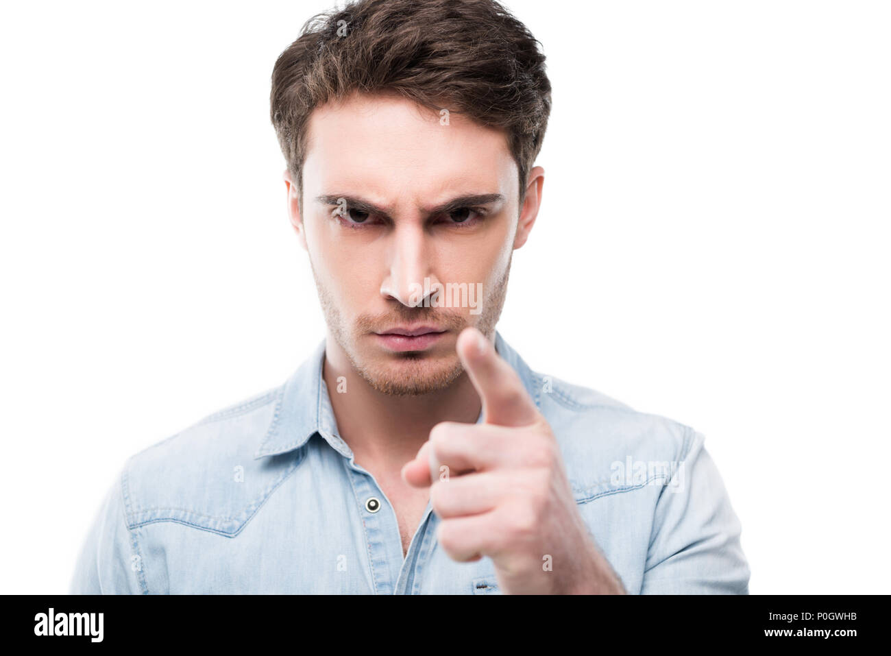 portrait of serious handsome man pointing at you, isolated on white ...