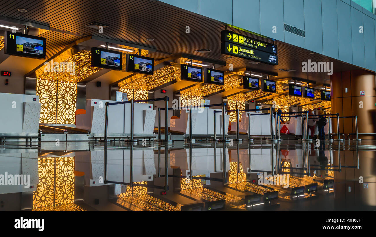 check-in counter in the airport with beautiful lighting. beautiful ...