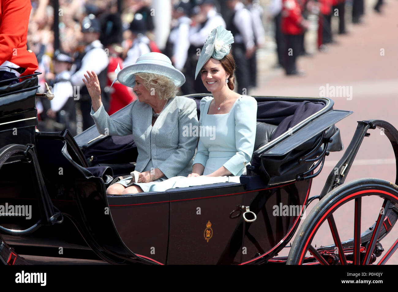 The Duchess of Cornwall (left) and the Duchess of Cambridge, arrive at ...
