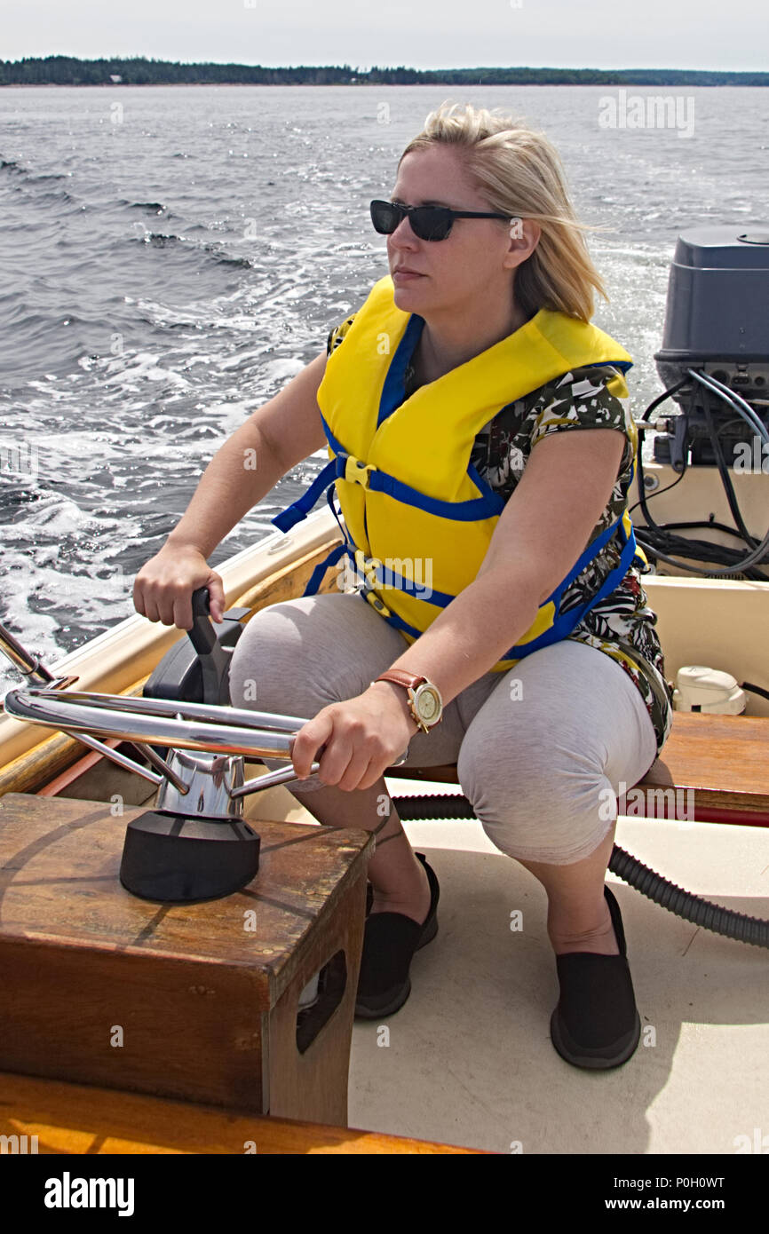 Woman wheel boat hi-res stock photography and images - Alamy
