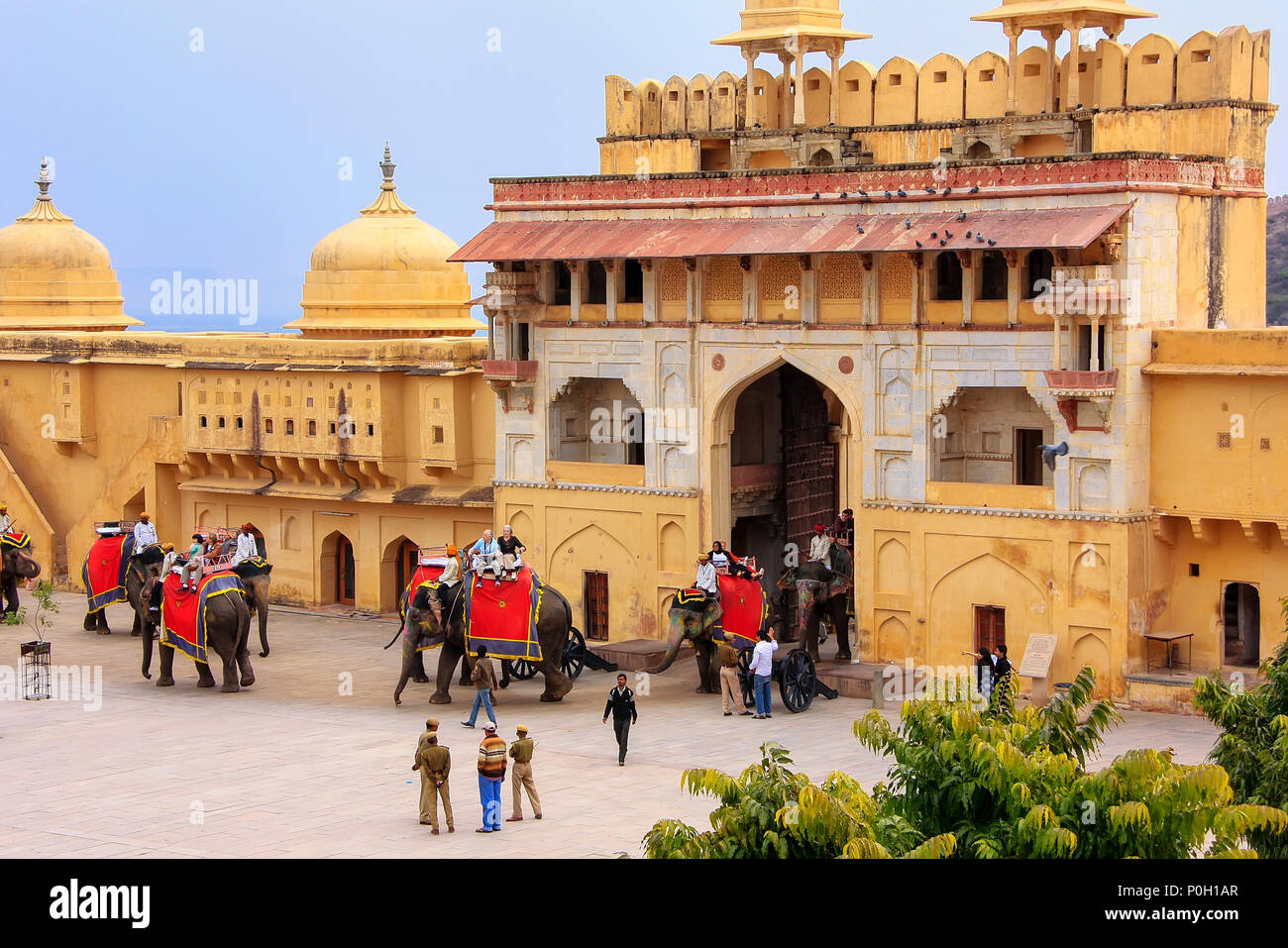 Decorated elephants entering Suraj Pol in Jaleb Chowk (main courtyard ...