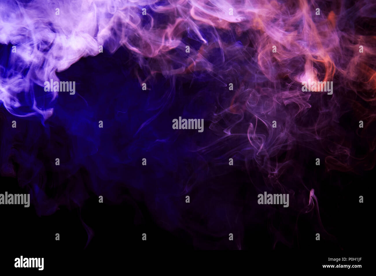 Thickpink and purple smoke on a black isolated background. Background ...
