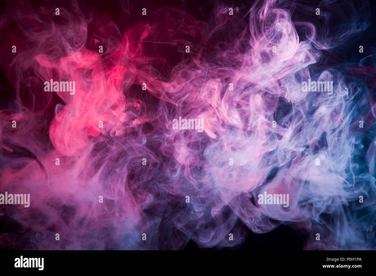 Colorful pink and blue smoke on a black isolated background. Background ...