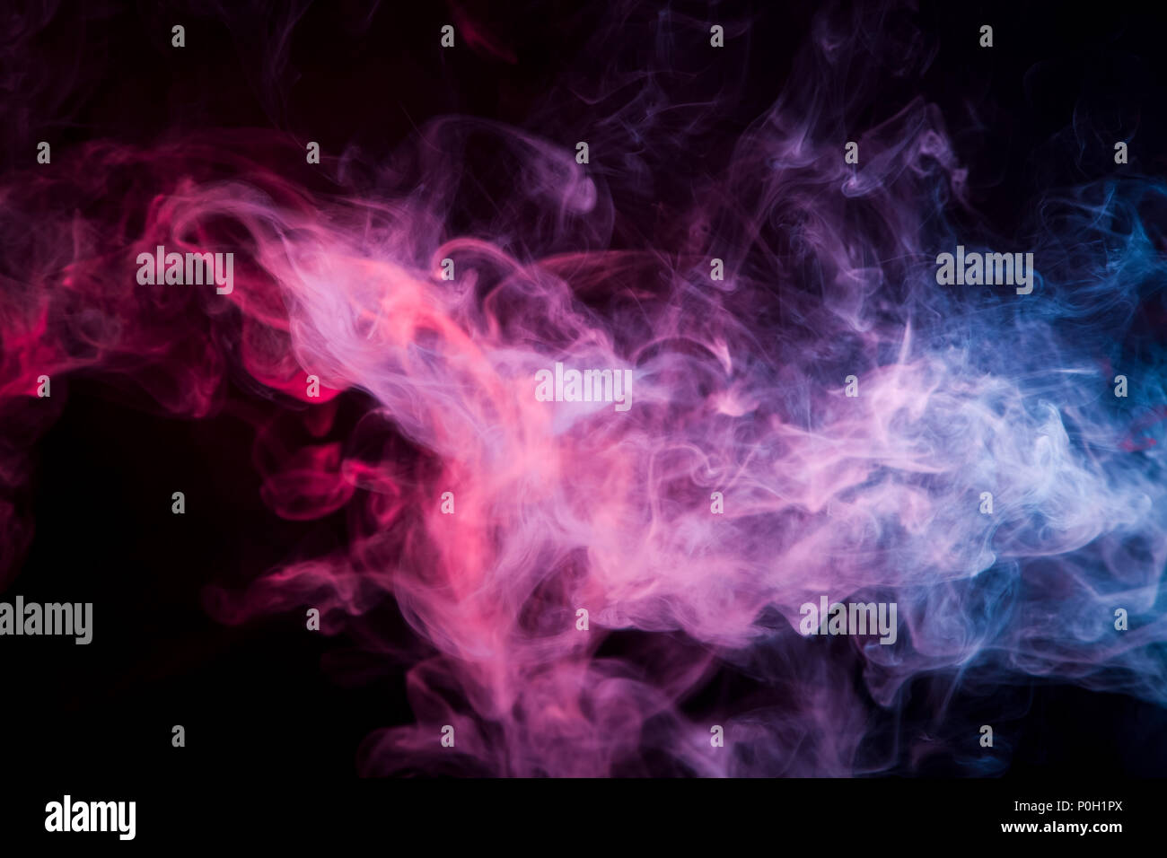 Colorful pink and blue smoke on a black isolated background. Background ...