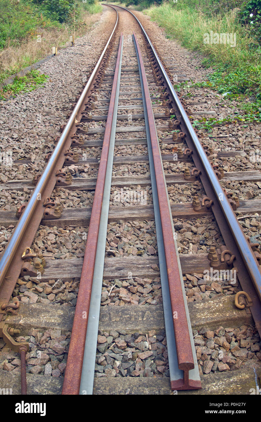 Train tracks Railway lines going into distance UK Stock Photo - Alamy
