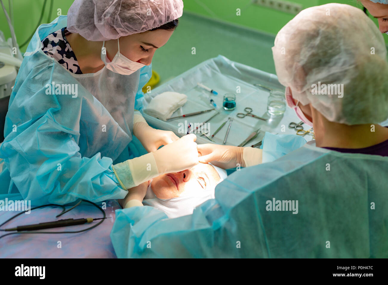 Plastic surgery in operating room Stock Photo - Alamy