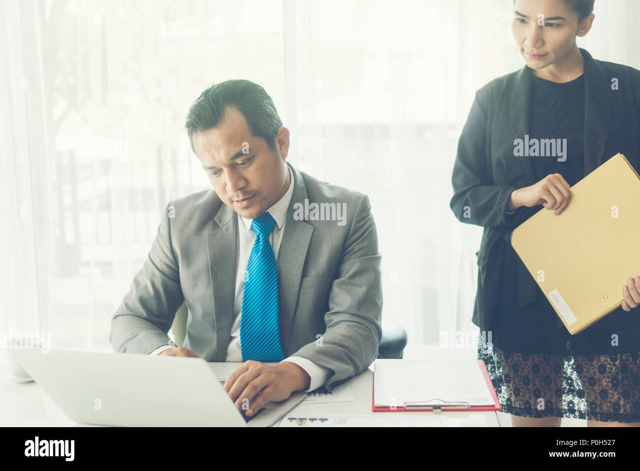 business people serious and working hard together in the office Stock ...