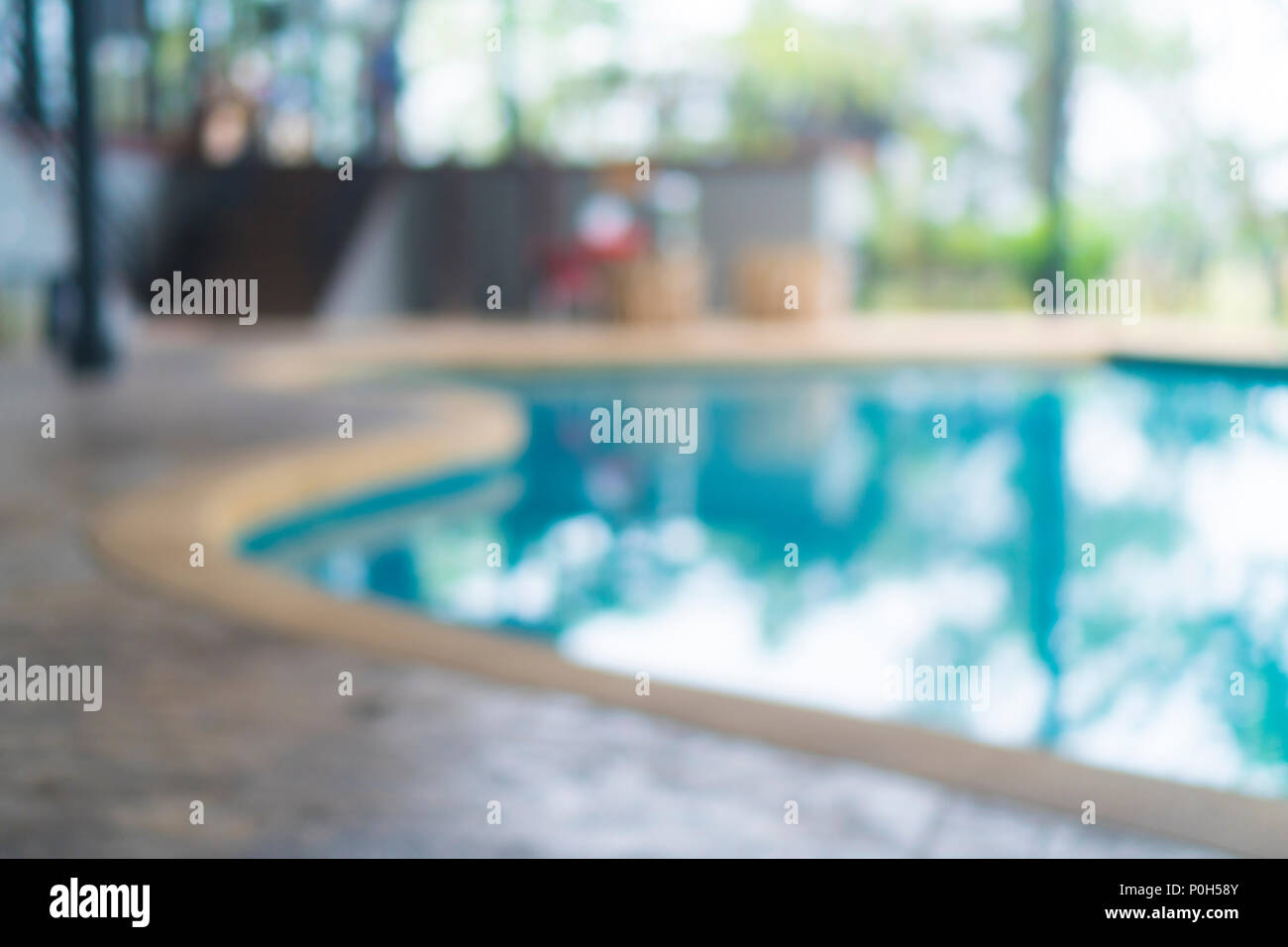 blurry background of swimming pool view Stock Photo - Alamy