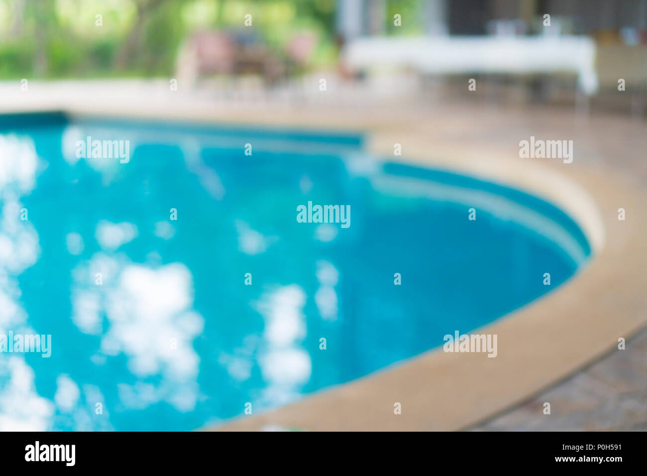blurry background of swimming pool view Stock Photo - Alamy