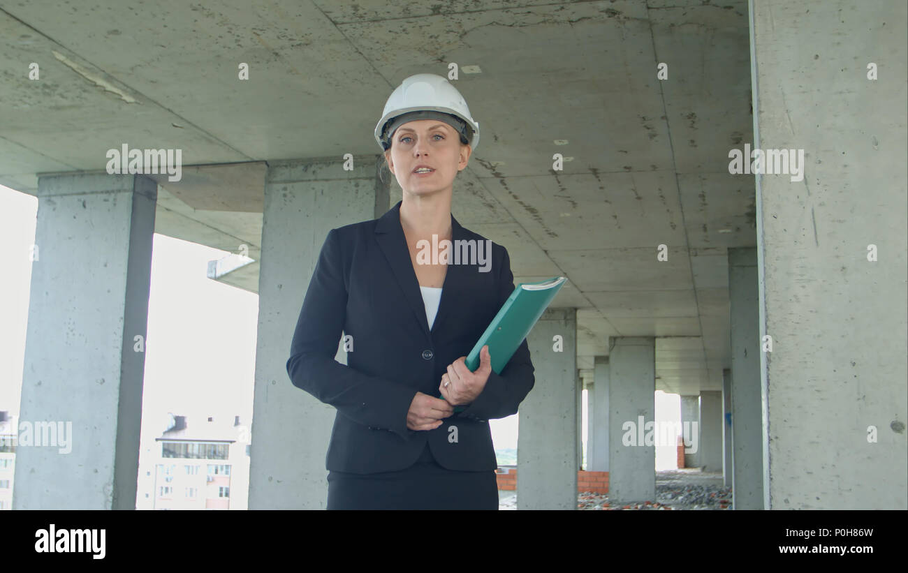 Female engineer looking blueprint 4k hi-res stock photography and ...