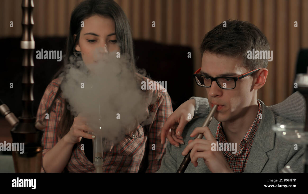 Group of friends talking indoor lounge hi-res stock photography and ...