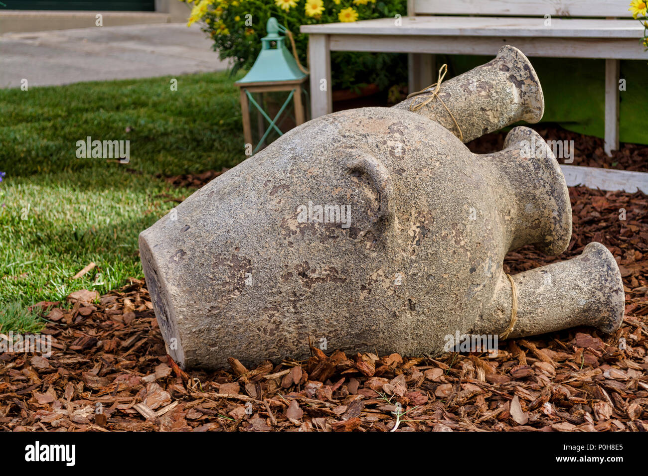 Closeup of ancient amphora in the street in the morning Stock Photo - Alamy