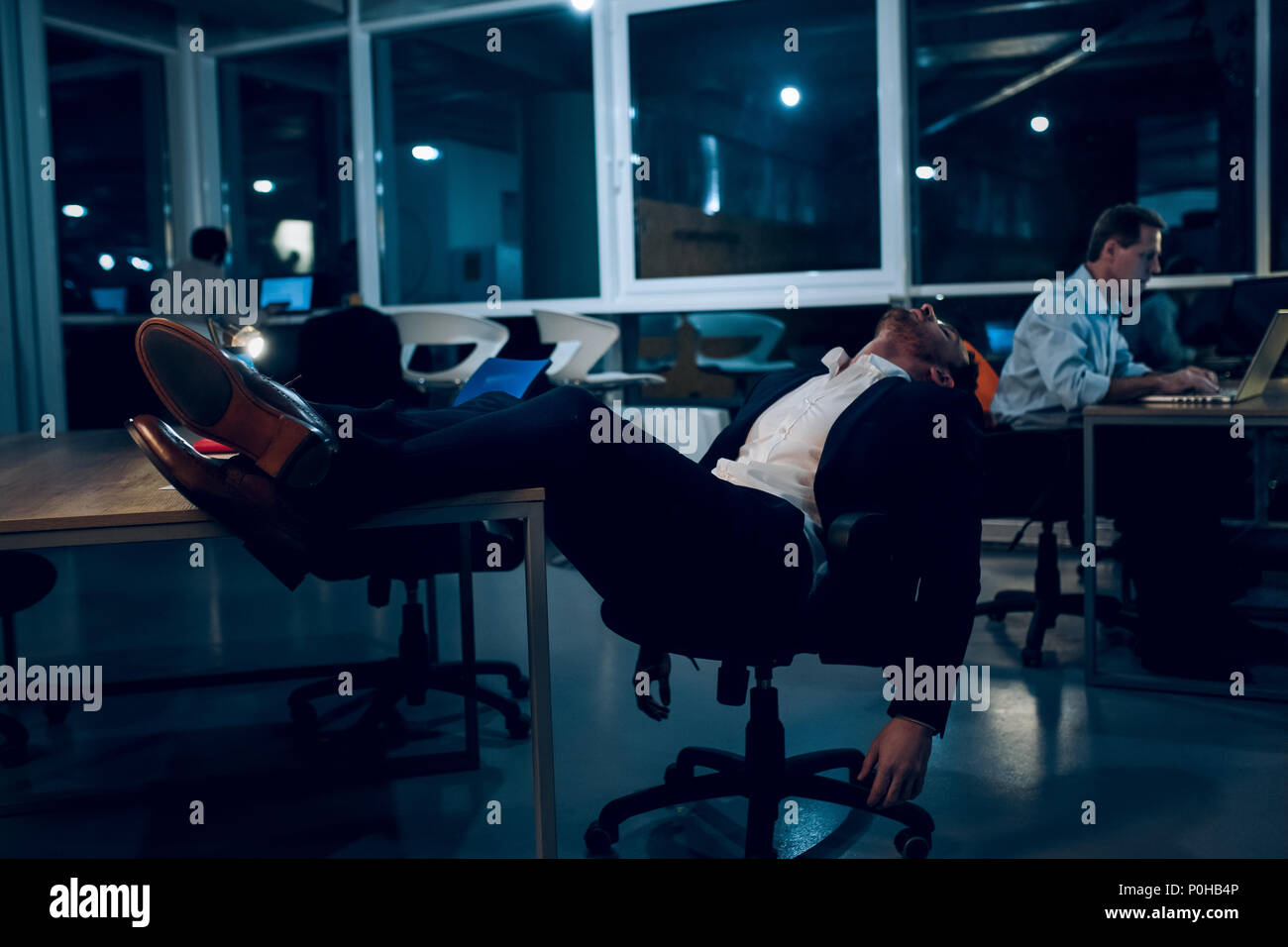 Person falling asleep desk hi-res stock photography and images - Alamy