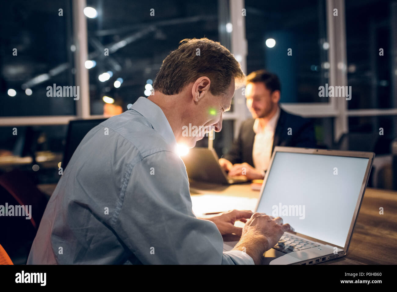 Staying late office hi-res stock photography and images - Alamy
