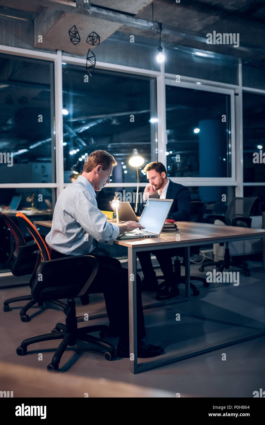Staying late office hi-res stock photography and images - Alamy