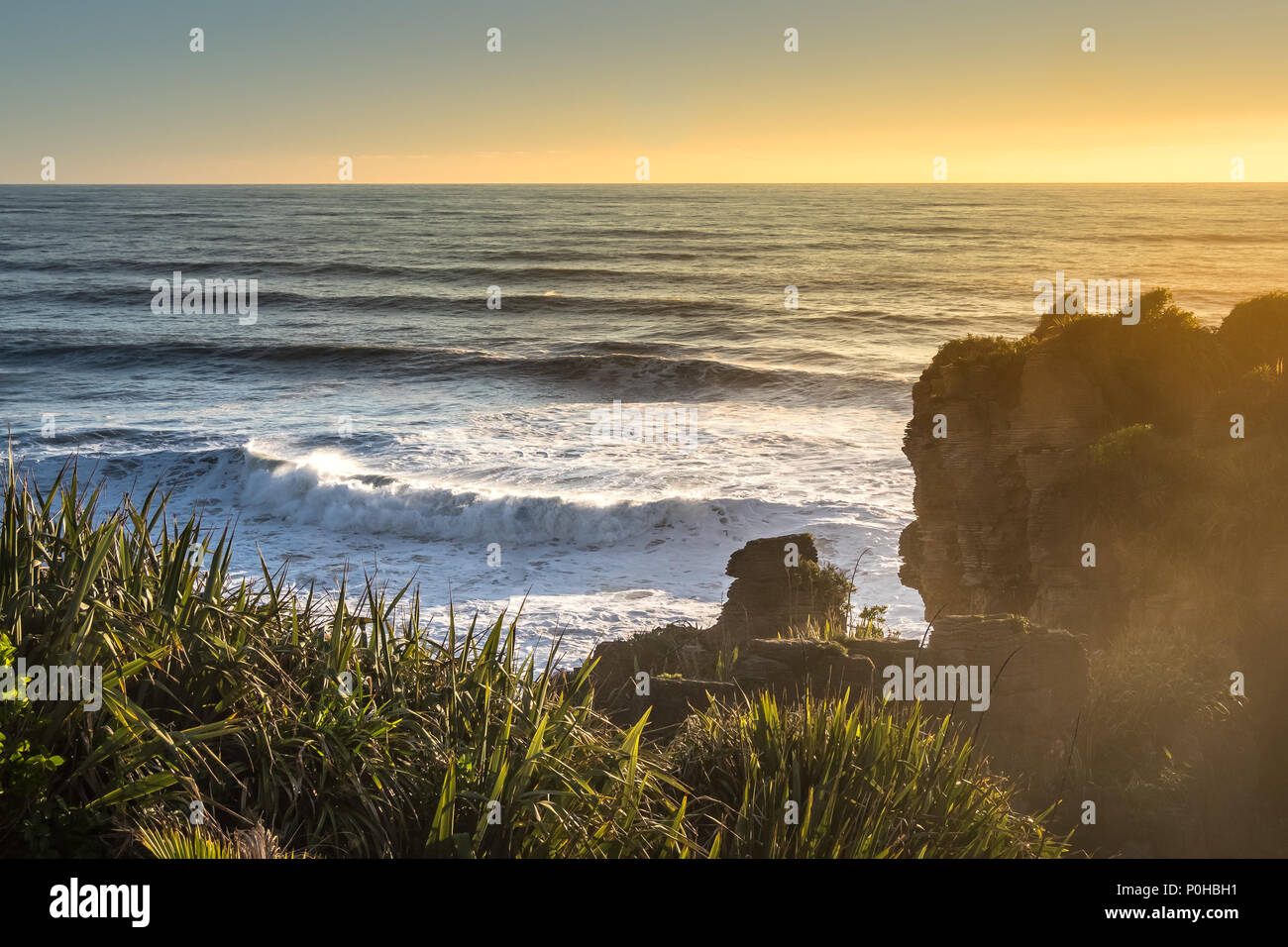 Sunset at Punakaiki pancake rocks and blowholes in the west coast of ...