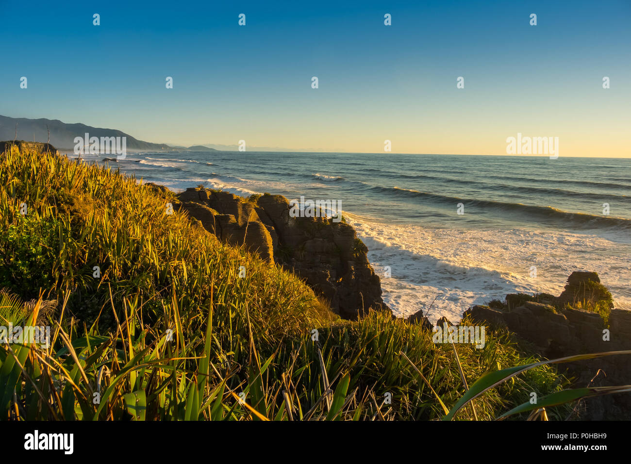 Sunset at Punakaiki pancake rocks and blowholes in the west coast of ...