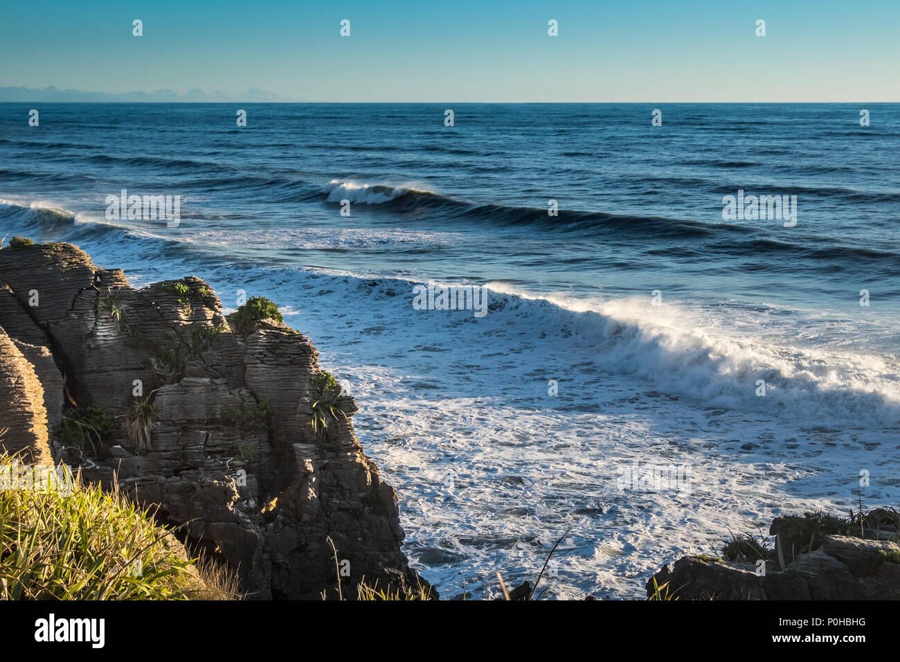 Sunset at Punakaiki pancake rocks and blowholes in the west coast of ...