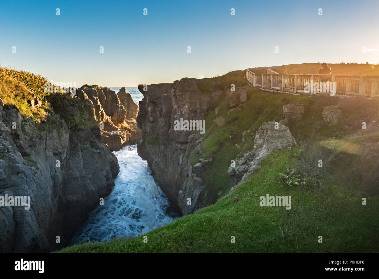 Sunset at Punakaiki pancake rocks and blowholes in the west coast of ...