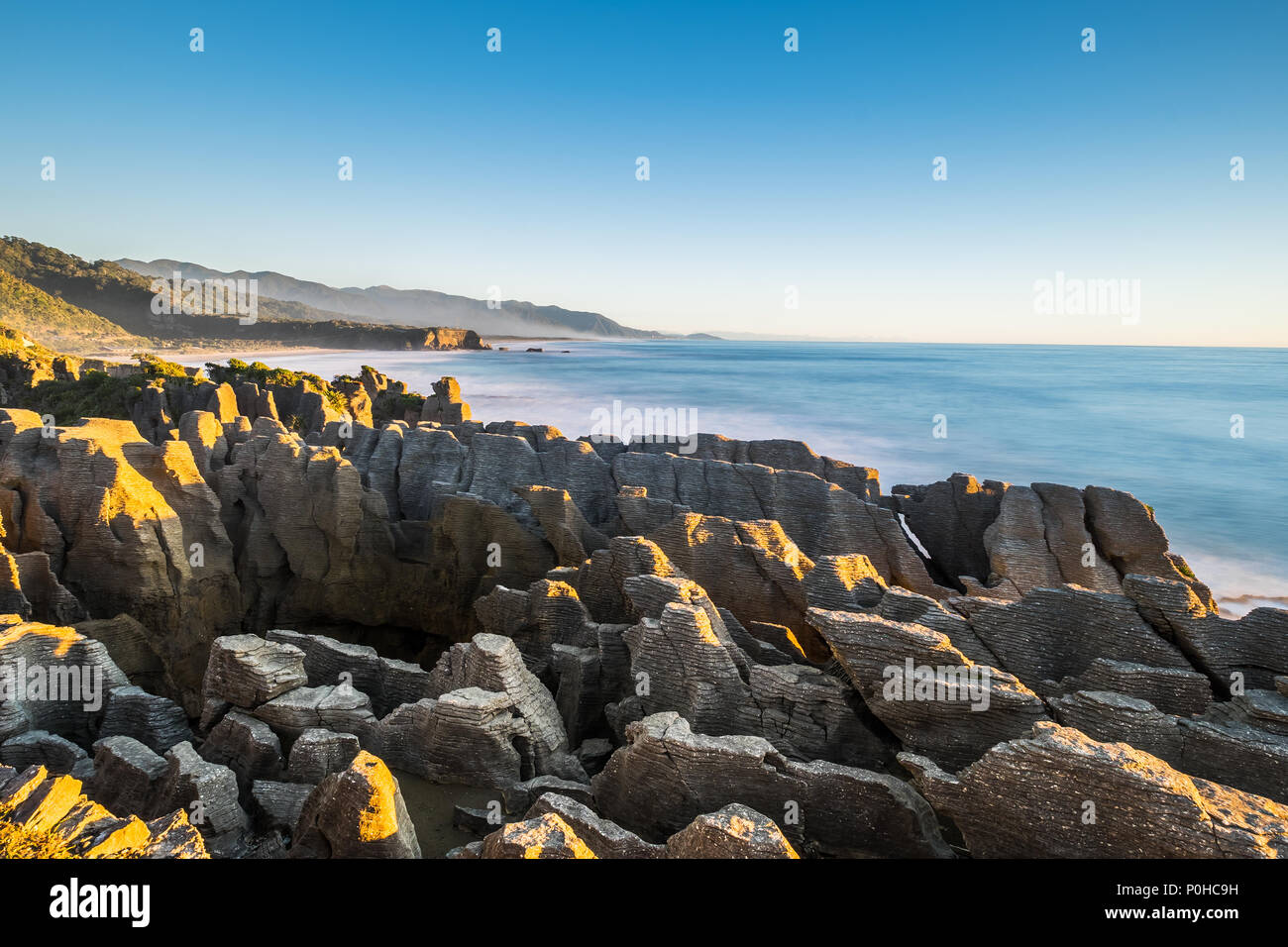 Sunset at Punakaiki pancake rocks and blowholes in the west coast of ...