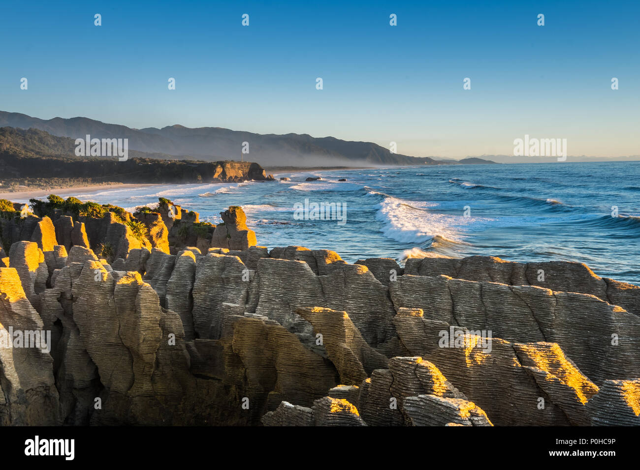 Sunset at Punakaiki pancake rocks and blowholes in the west coast of ...