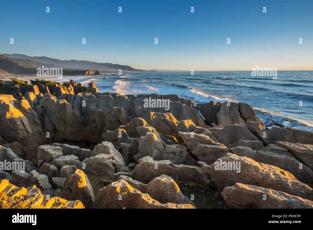 Sunset at Punakaiki pancake rocks and blowholes in the west coast of ...