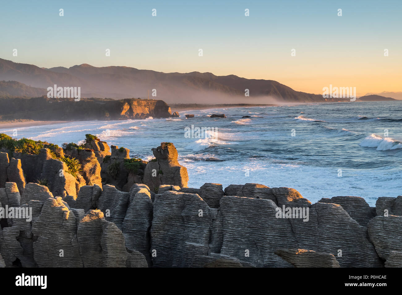 Sunset at Punakaiki pancake rocks and blowholes in the west coast of ...