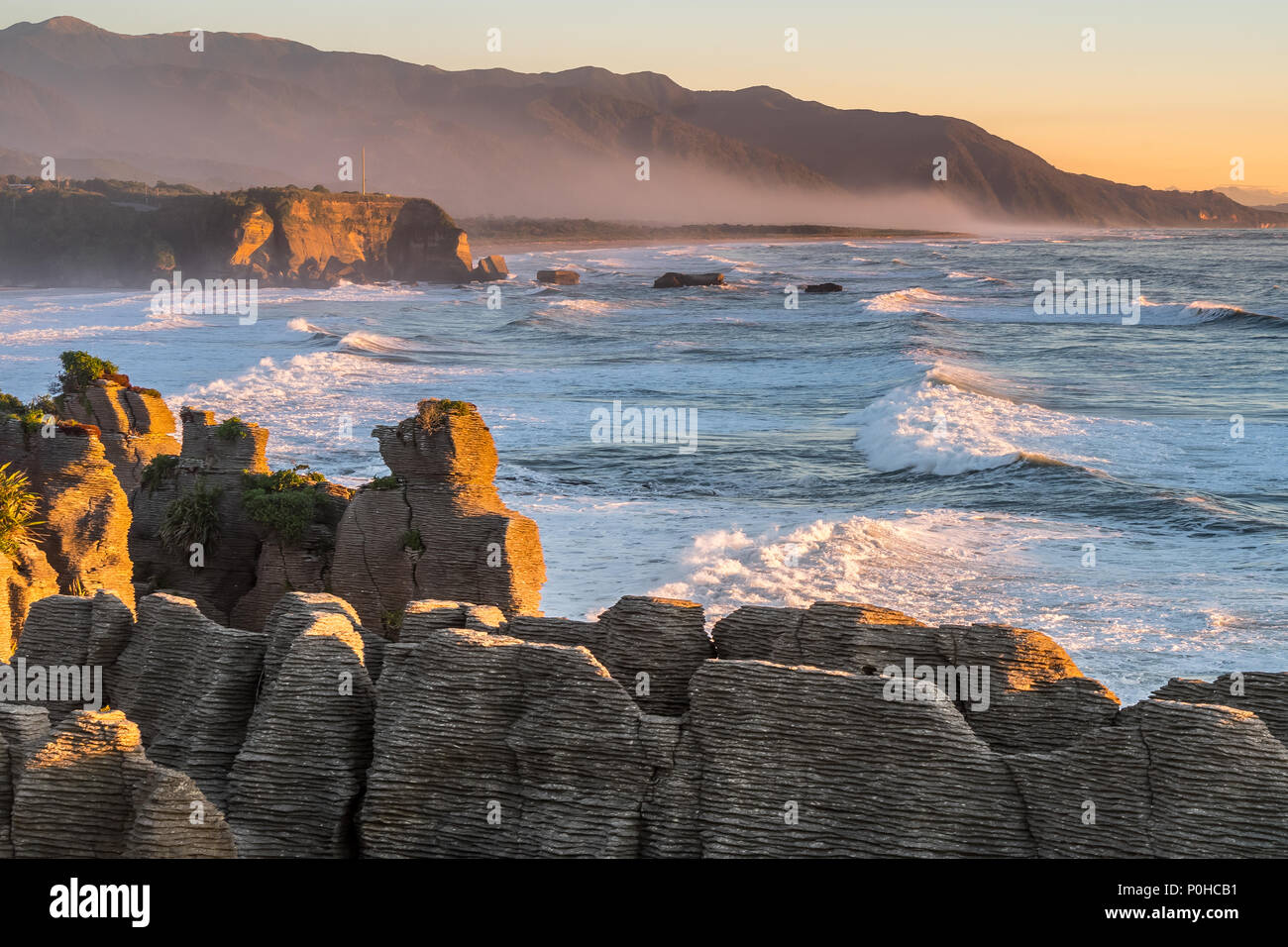 Sunset at Punakaiki pancake rocks and blowholes in the west coast of ...