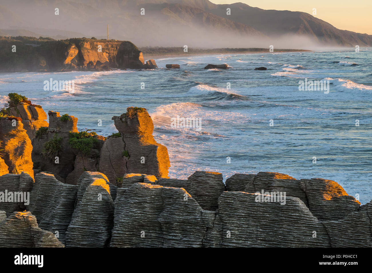 Sunset at Punakaiki pancake rocks and blowholes in the west coast of ...
