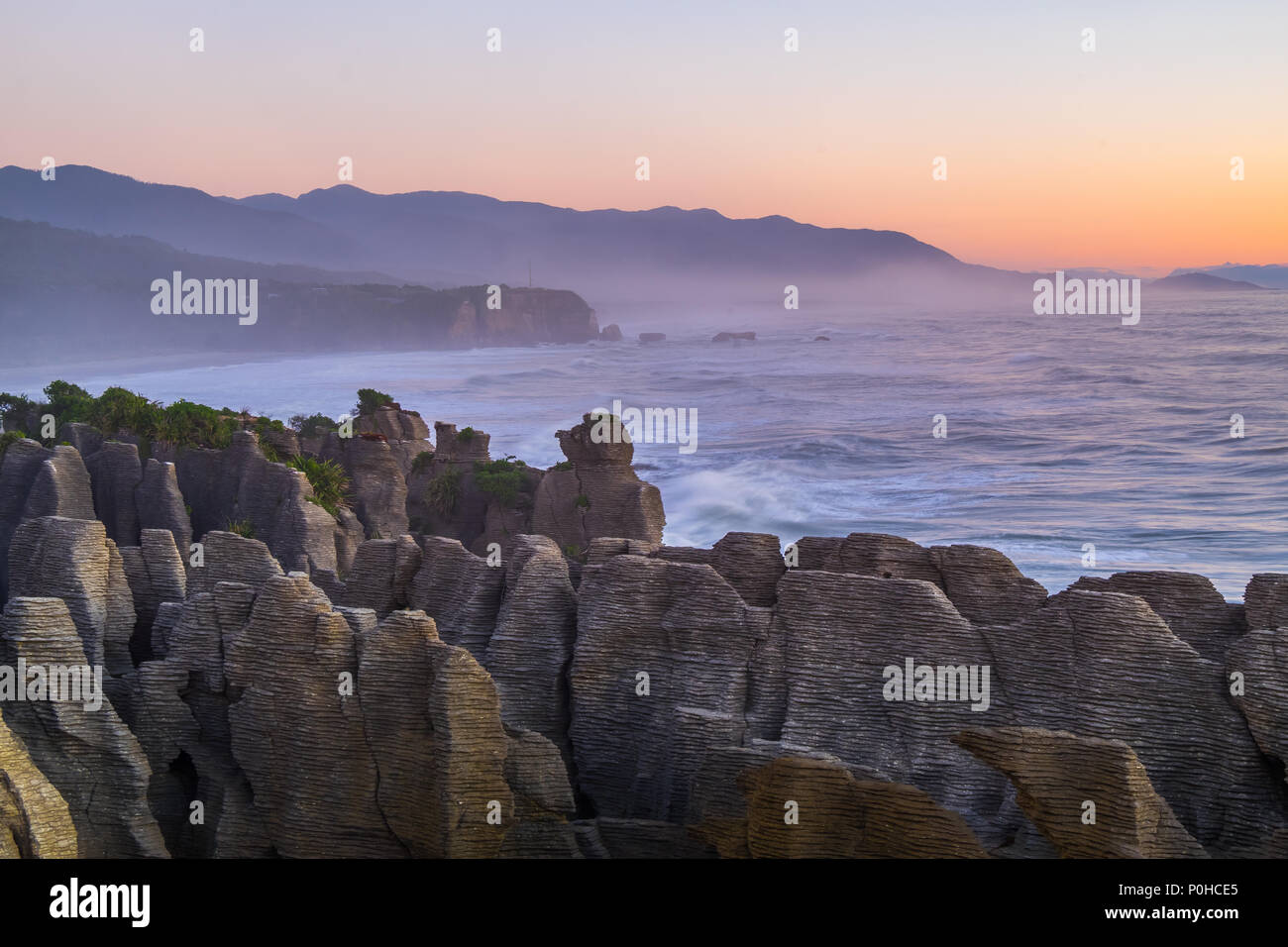 Sunset at Punakaiki pancake rocks and blowholes in the west coast of ...