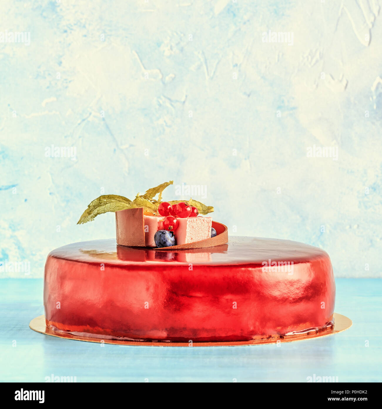 Red Cream Icing Cake with Fruits and Chocolate. Birthday cake Stock ...