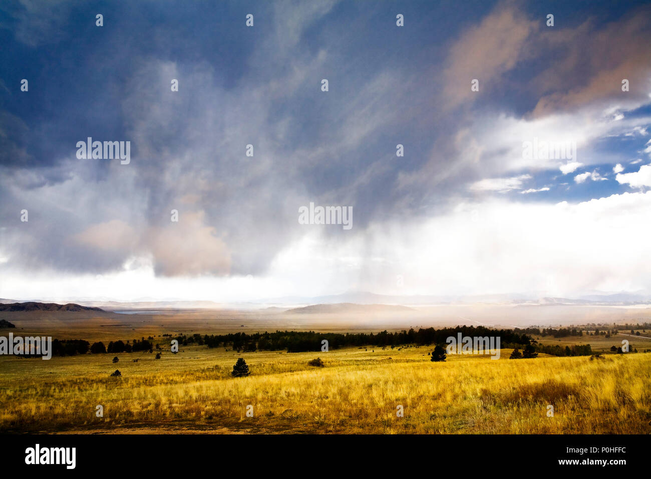 A rainstorm sweeps across Spinney State Recreation area in central ...