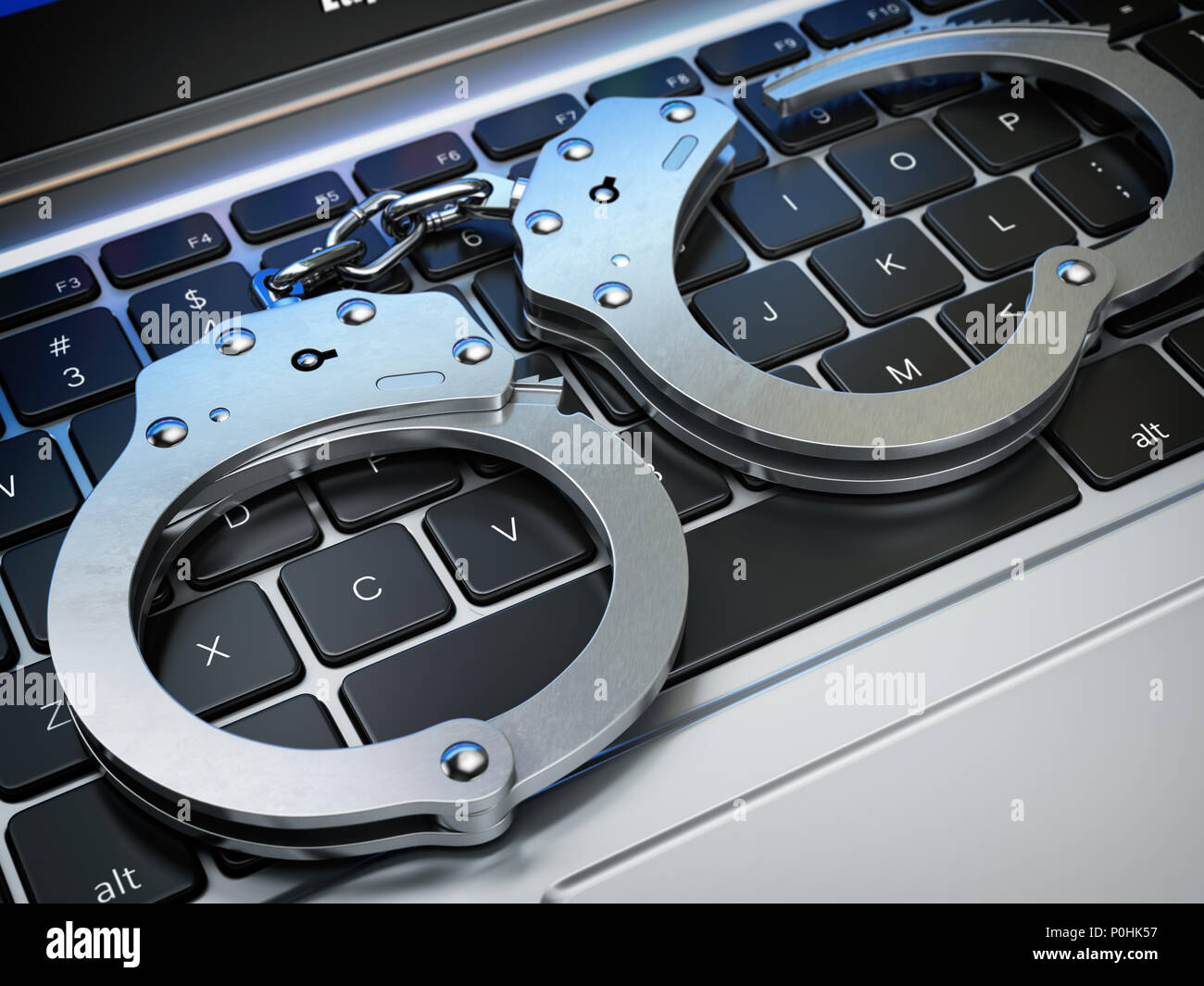 Handcuffs on the laptop keyboard. Internet cyber crime, hacking and ...