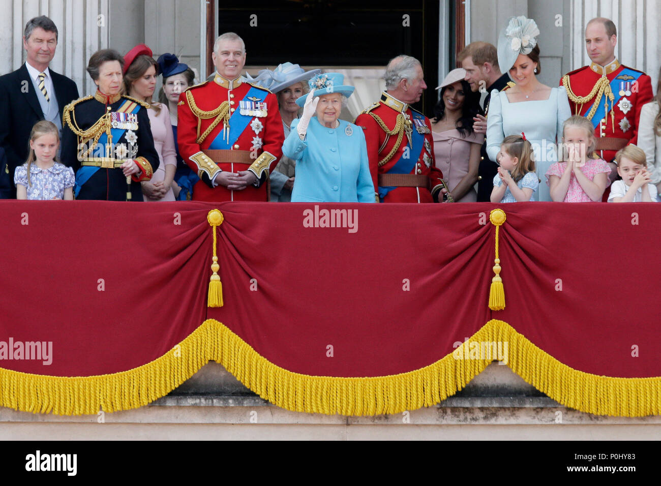London, UK. 9th June, 2018. Britain's Queen Elizabeth II (C) waves to ...