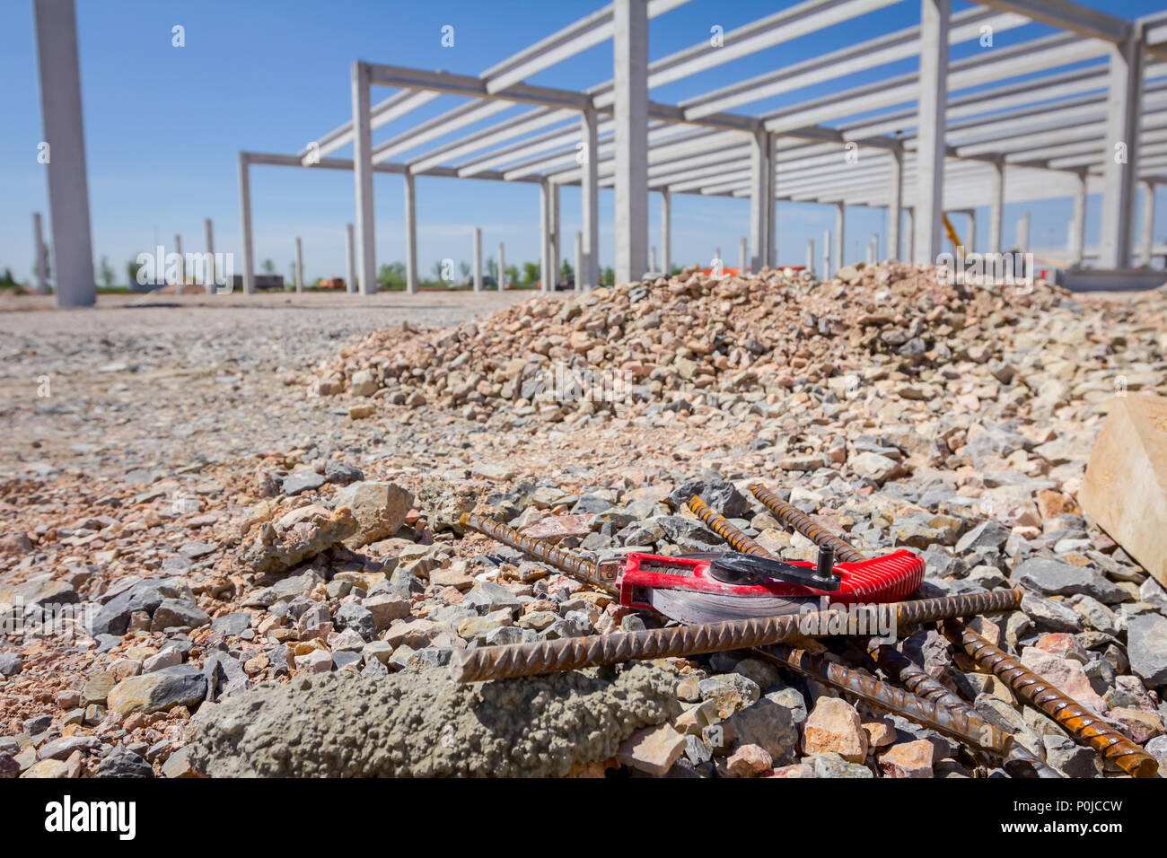 Land measure tape is on the ground after usage for construction site ...