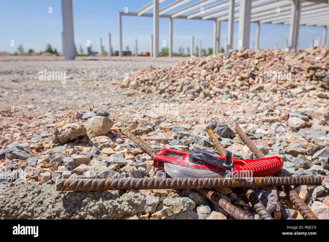 Land measure tape is on the ground after usage for construction site ...