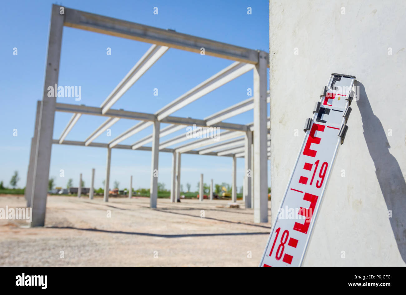 Telescopic leveling lath is helping surveyor, geodesist to measure ...