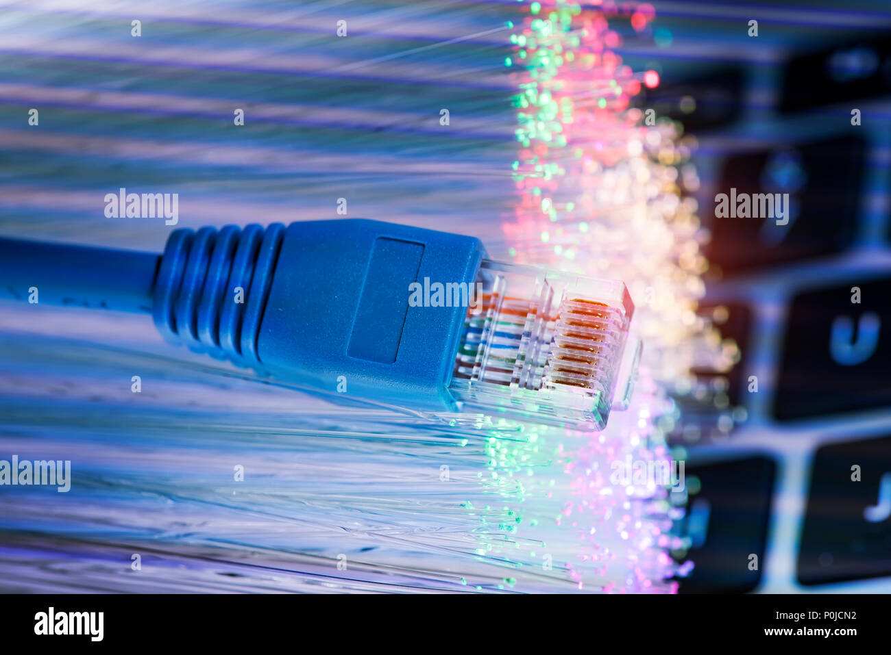 network cable closeup with fiber optical background Stock Photo - Alamy