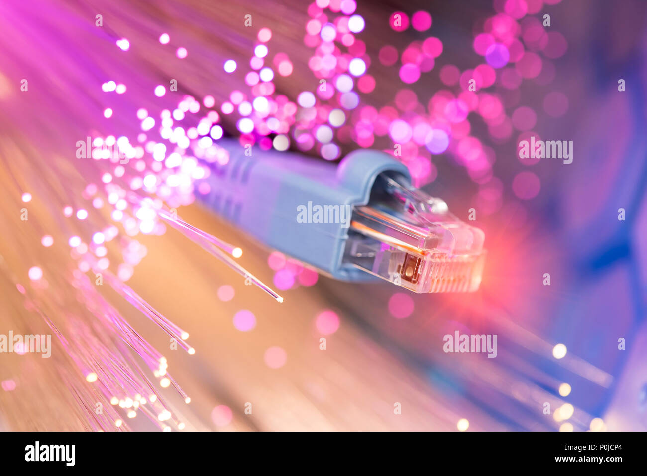 network cable closeup with fiber optical background Stock Photo - Alamy